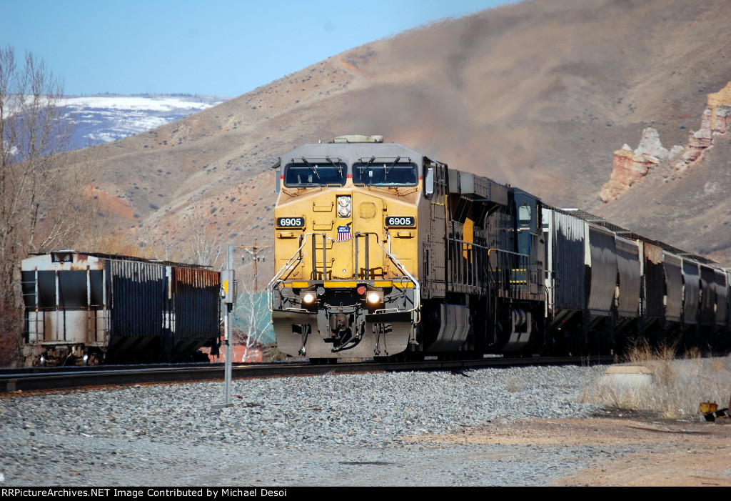 UP C44/60AC # 6905 leads an eastbound grain train at Echo, UT. March 10/ 2015